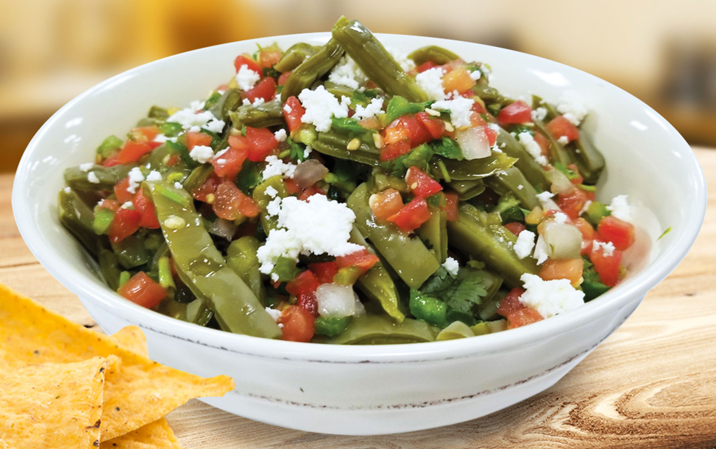 An authentic Mexican cactus stalk salad or “ensalada de nopales,” as it ...